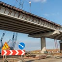 bypass (【Noun】a road that goes around a town or city or its center ...