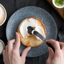 spread (【Verb】to put a substance on an object or surface in an even ...