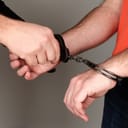 detainee (【Noun】a person kept in prison or custody, especially for ...