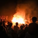 bonfire (【Noun】a large outdoor fire used for burning trash or as part ...