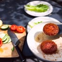 patty (【Noun】small pieces of meat, fish, etc. pressed into a flat ...