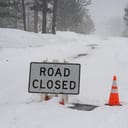 closure (【Noun】an act or process of closing a company, road, etc ...