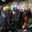 trap (【Verb】to prevent a person or thing from leaving a place ...