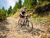 rugged (【Adjective】(of ground or terrain) having a surface that is ...