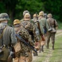 retreat (【Verb】(of an army) to move away from enemy forces after a ...