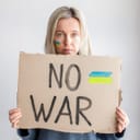 protest (【Noun】an organized public gathering in which people show that ...