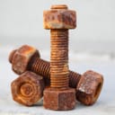 bolt (【Noun】a piece of metal that screws into a nut to fasten things ...