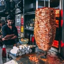 shawarma (【Noun】meat cooked on a rotating spit; a pita bread filled ...