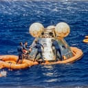 capsule (【Noun】a part of a vehicle, typically a spacecraft, in which ...