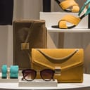 accessory (【Noun】a small object carried or worn to improve the ...