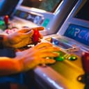 arcade (【Noun】an indoor area with coin-operated game machines ) Meaning ...
