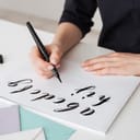 calligraphy (【Noun】decorative handwriting done with special pens or ...