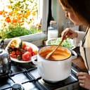 stir (【Verb】to move a spoon or other tool through a substance in order ...