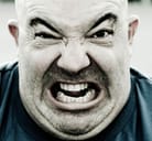 hostile (【Adjective】showing or feeling opposition or aggression ...