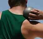 shot put (【Noun】the sport of throwing a heavy metal ball from the ...