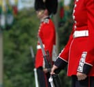 guard (【Noun】someone whose job is to provide protection or security for ...