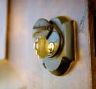 lock (【Noun】a device used to keep a door, window, container, etc ...