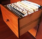drawer (【Noun】a container shaped like a box that is part of a desk or ...