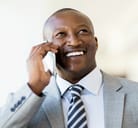 grin (【Verb】smile broadly, usually showing one's teeth in the process ...