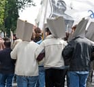 protest (【Noun】an organized public gathering in which people show that ...