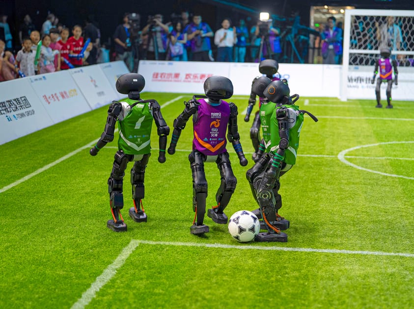 Fans Enjoy Robot Soccer Match in Beijing | Engoo Daily News